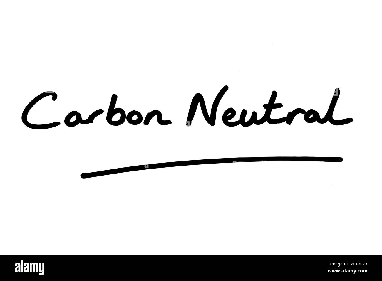 Carbon Neutral handwritten on a white background Stock Photo - Alamy