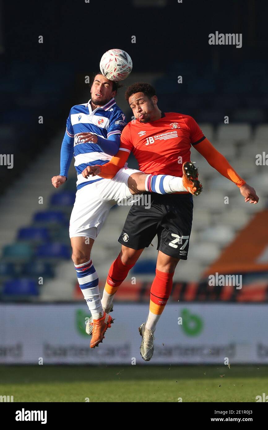 Luton, UK. 09th Jan, 2021. Sam Nombe of Luton Town and Tom McIntyre of ...