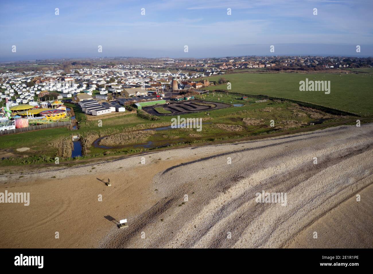 Selsey Beach with the popular holiday caravan park in the background at ...