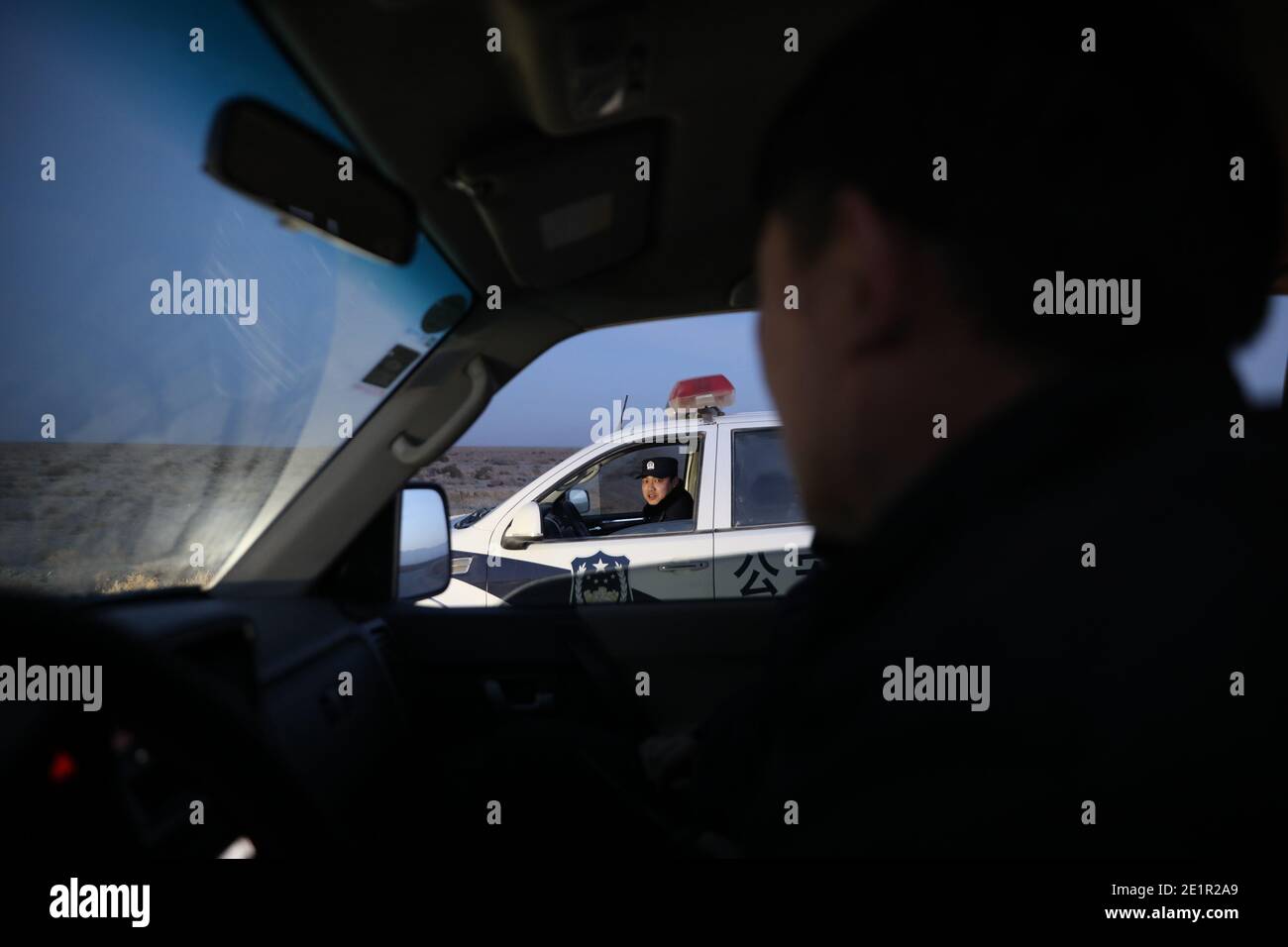 (210109) -- AKSAY, Jan. 9, 2021 (Xinhua) -- Police officers patrol in ...