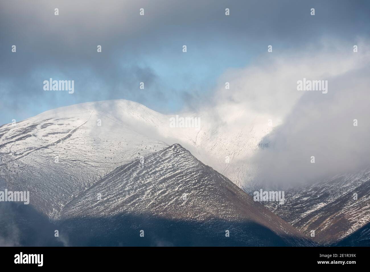Stunning landscape image of Skiddaw snow capped mountain range in Lake ...