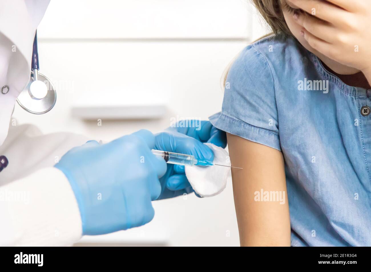 Vaccination of children. Hand injection. Viborochniy focus People Stock ...