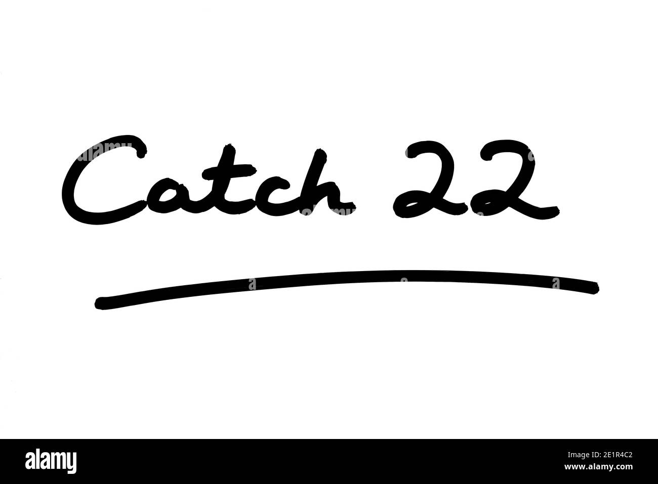 Catch 22 handwritten on a white background Stock Photo - Alamy