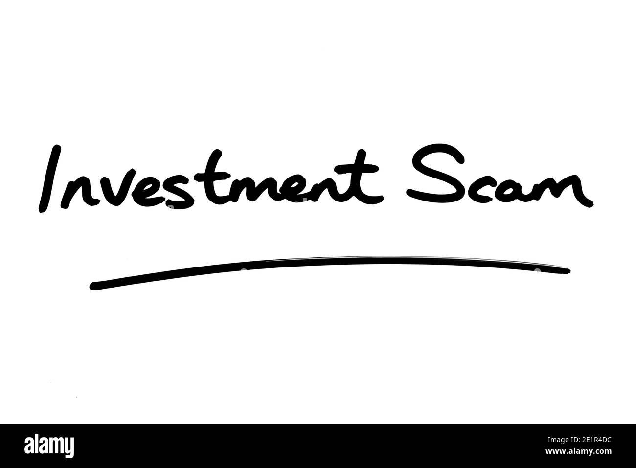 Investment Scam handwritten on a white background Stock Photo - Alamy