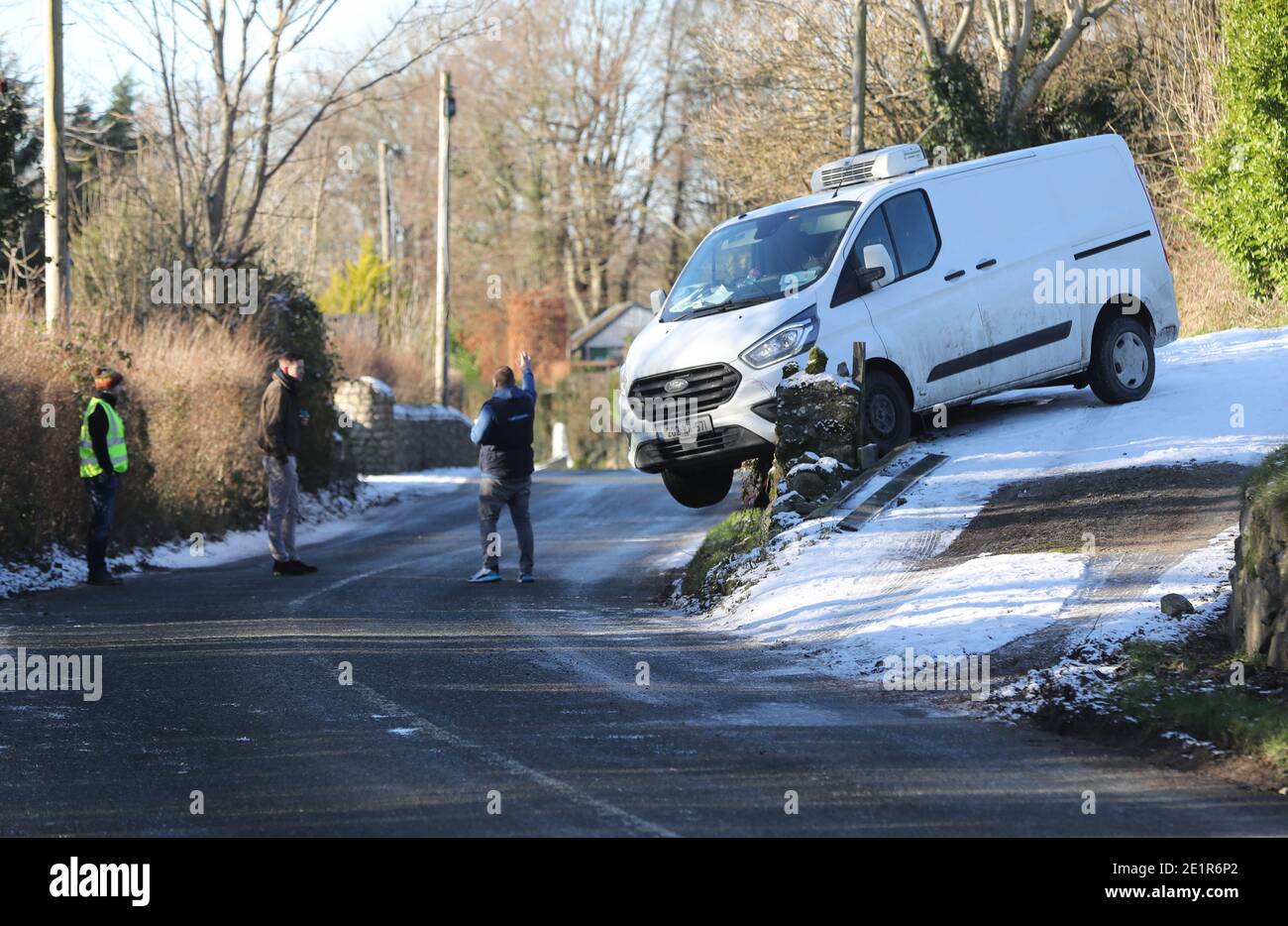 The scene after milkman has slid his van down an icy hill in Lacken, Co ...
