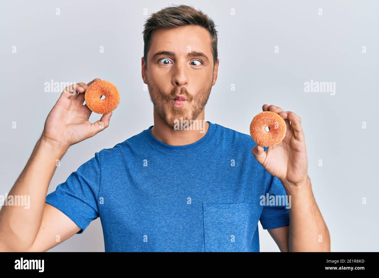 Silly man eating snack food hi-res stock photography and images - Alamy