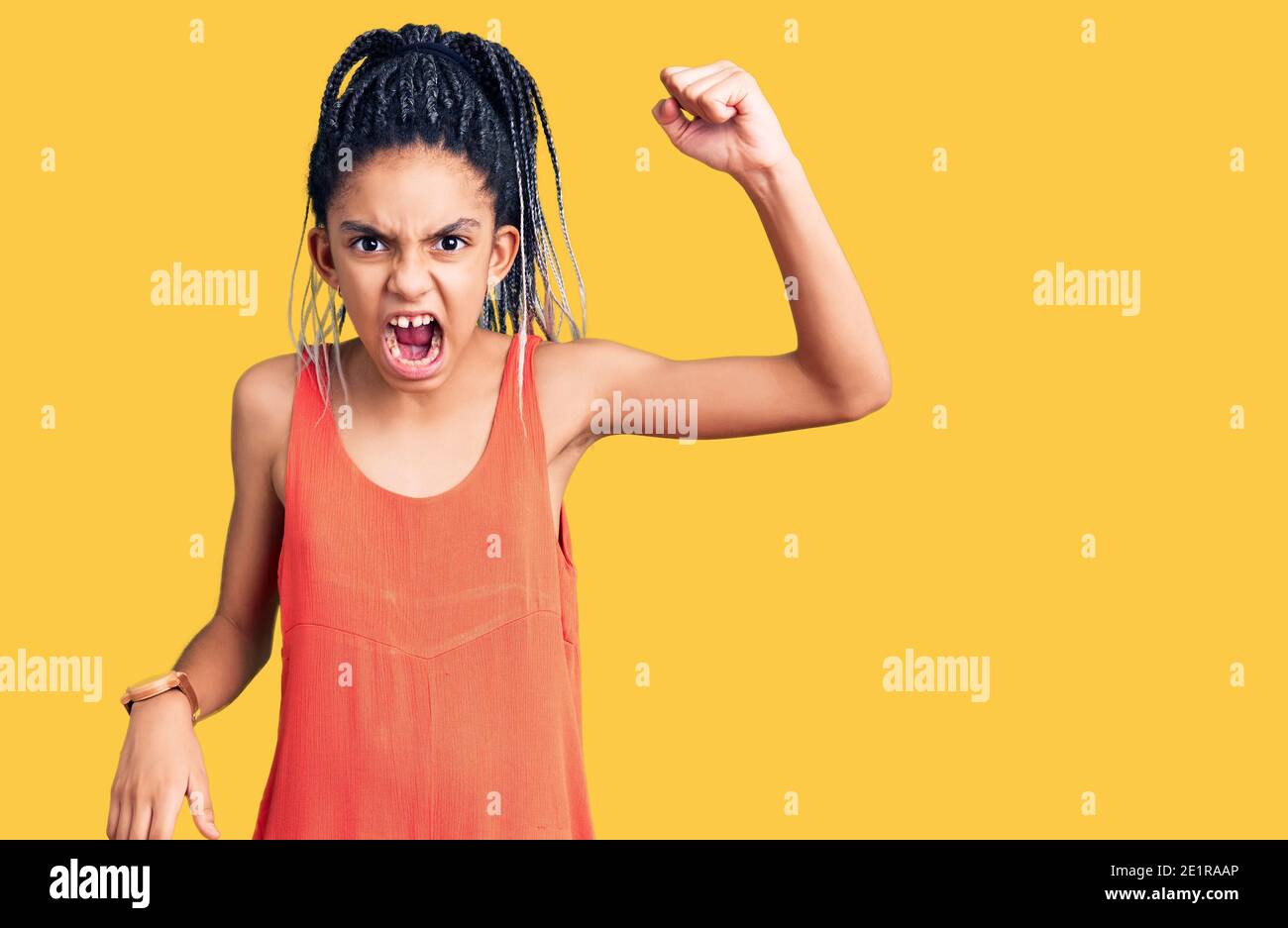 Cute african american girl wearing casual clothes angry and mad raising ...