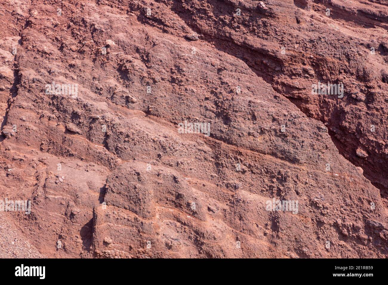 Santorini - Red pumice layers Stock Photo - Alamy