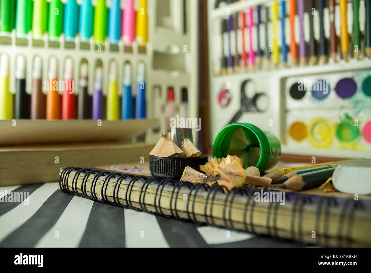 Drawing school utensils, on an abstract background of geometric figures ...