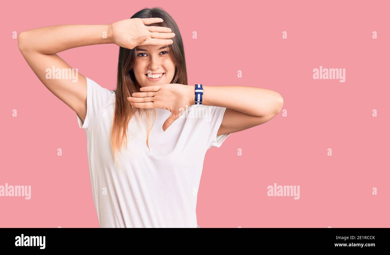 Beautiful caucasian woman wearing casual white tshirt smiling cheerful ...