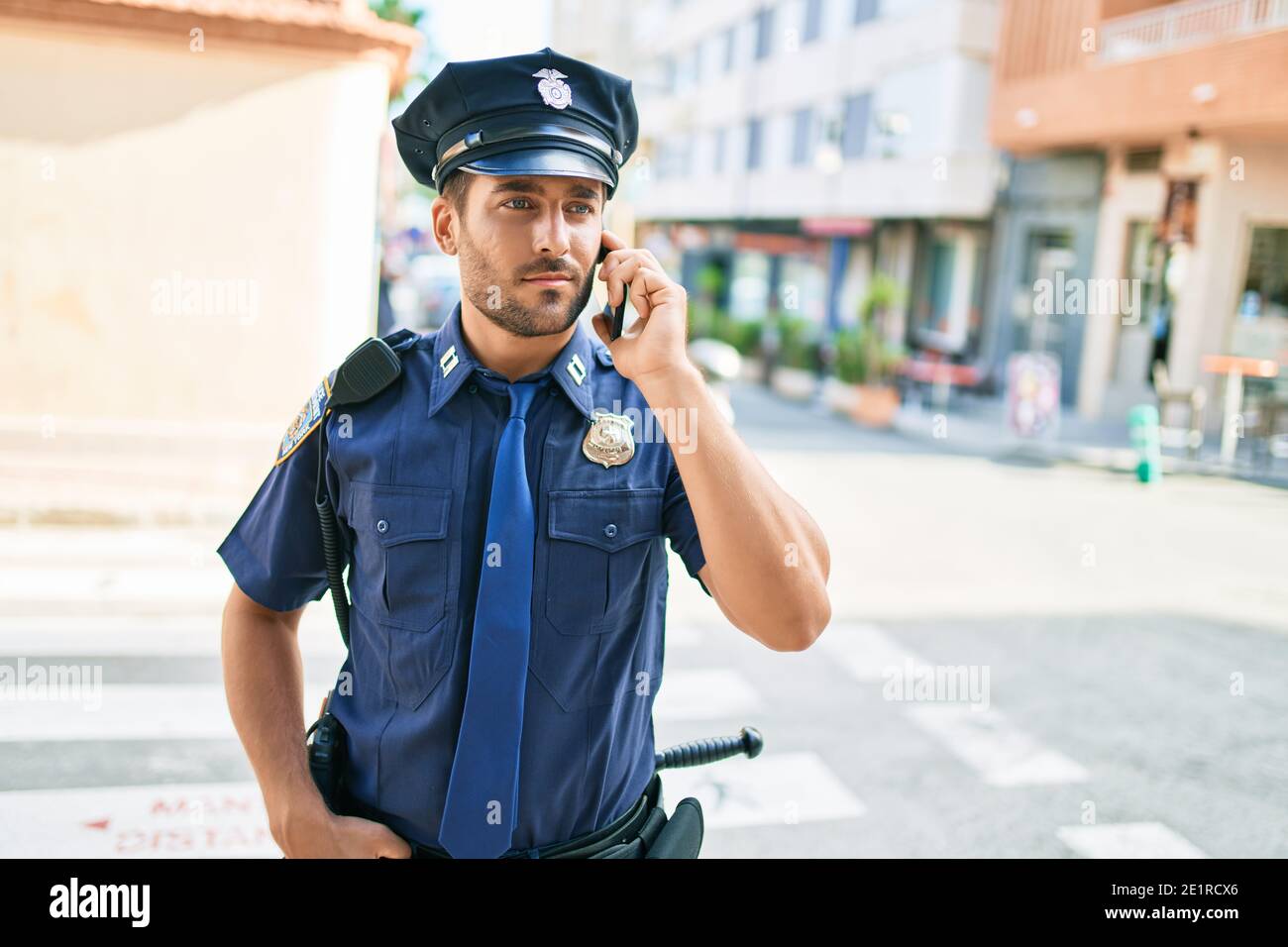 Authority communication smiling standing uniform hi-res stock ...