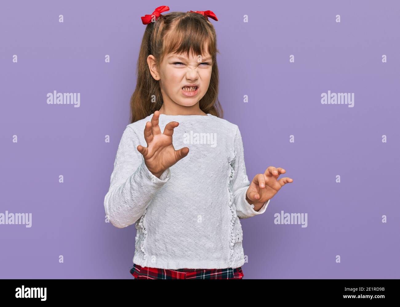 Little caucasian girl kid wearing casual clothes disgusted expression ...