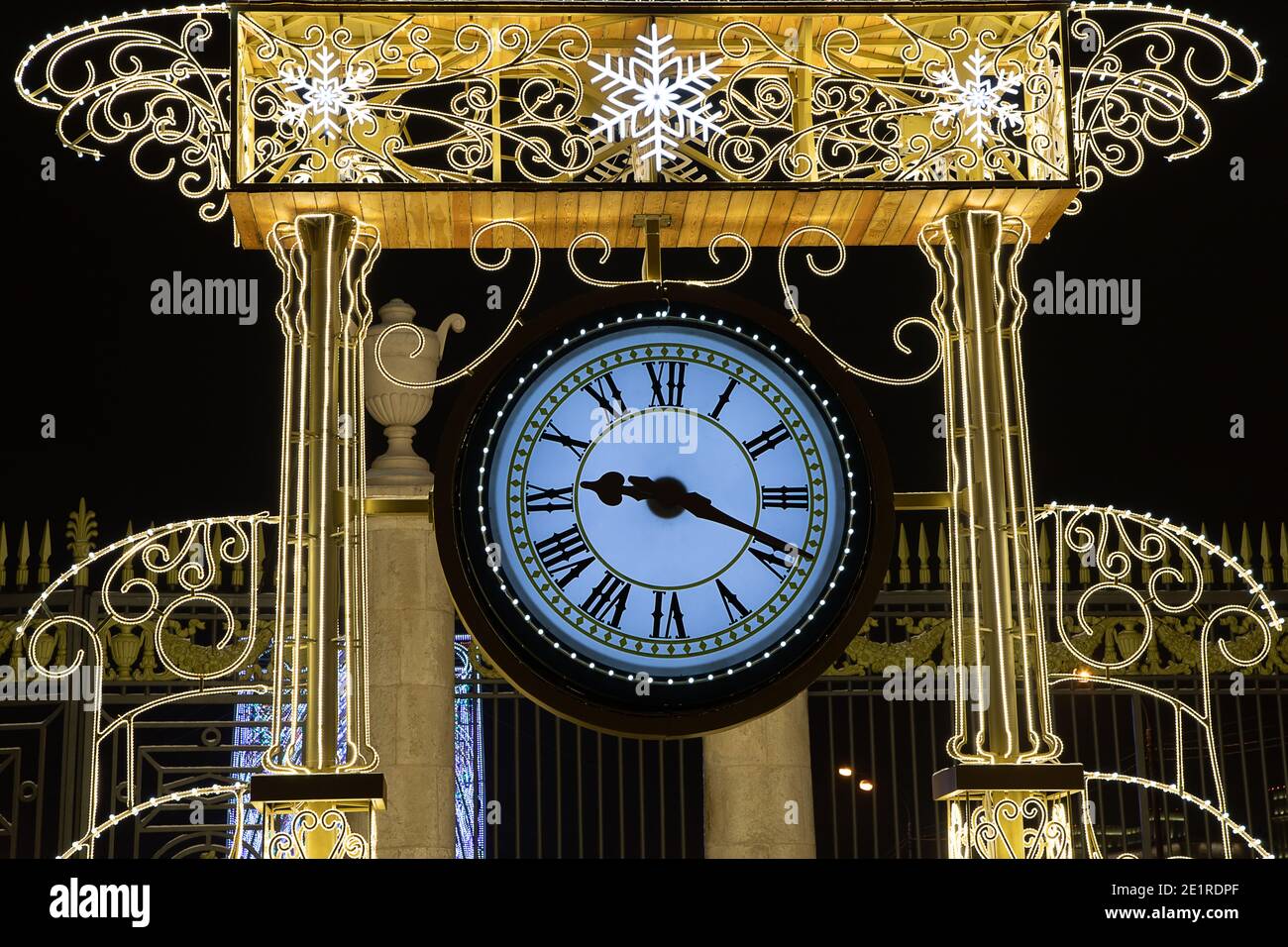 clock decorated with illumination. Countdown time. A fabulous gold ...