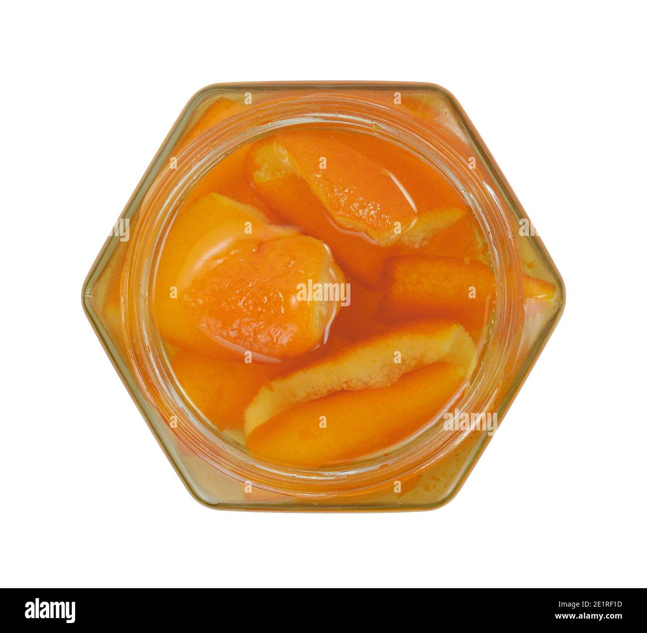 Orange peel preserve in a transparent jar isolated on white background ...