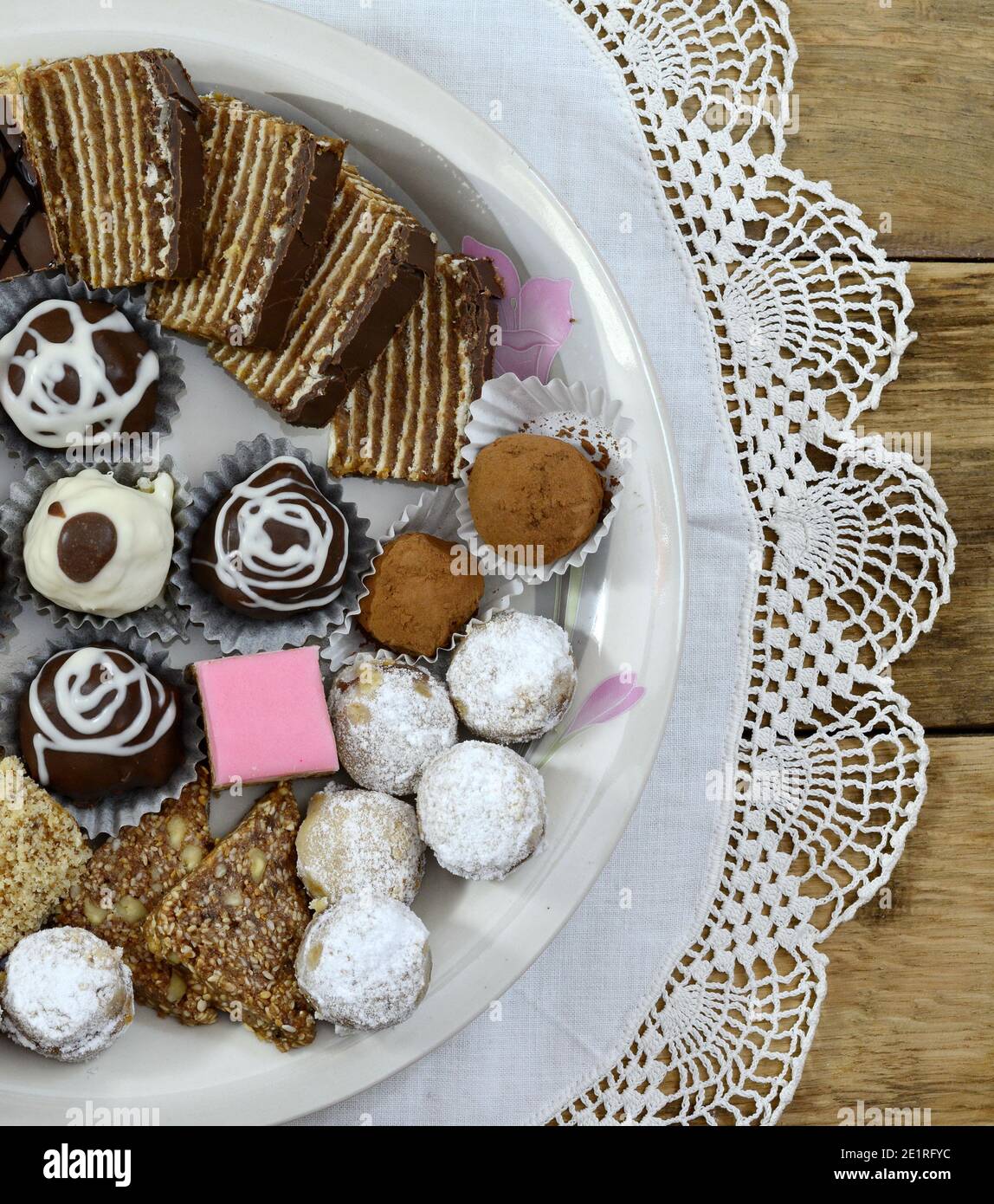 Plate full of cookies, different in shape and taste, beautifully ...