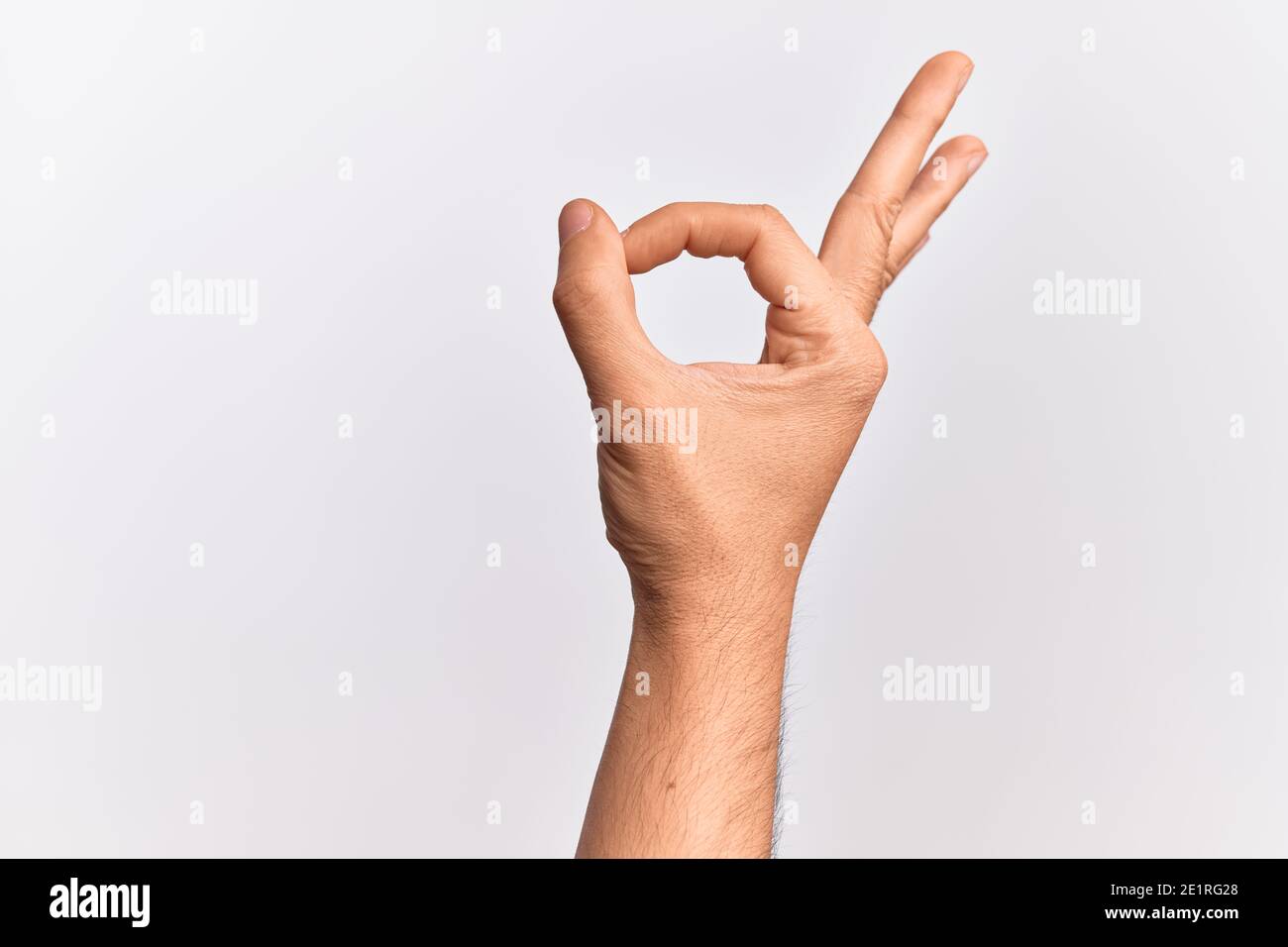 Hand of caucasian young man showing fingers over isolated white ...