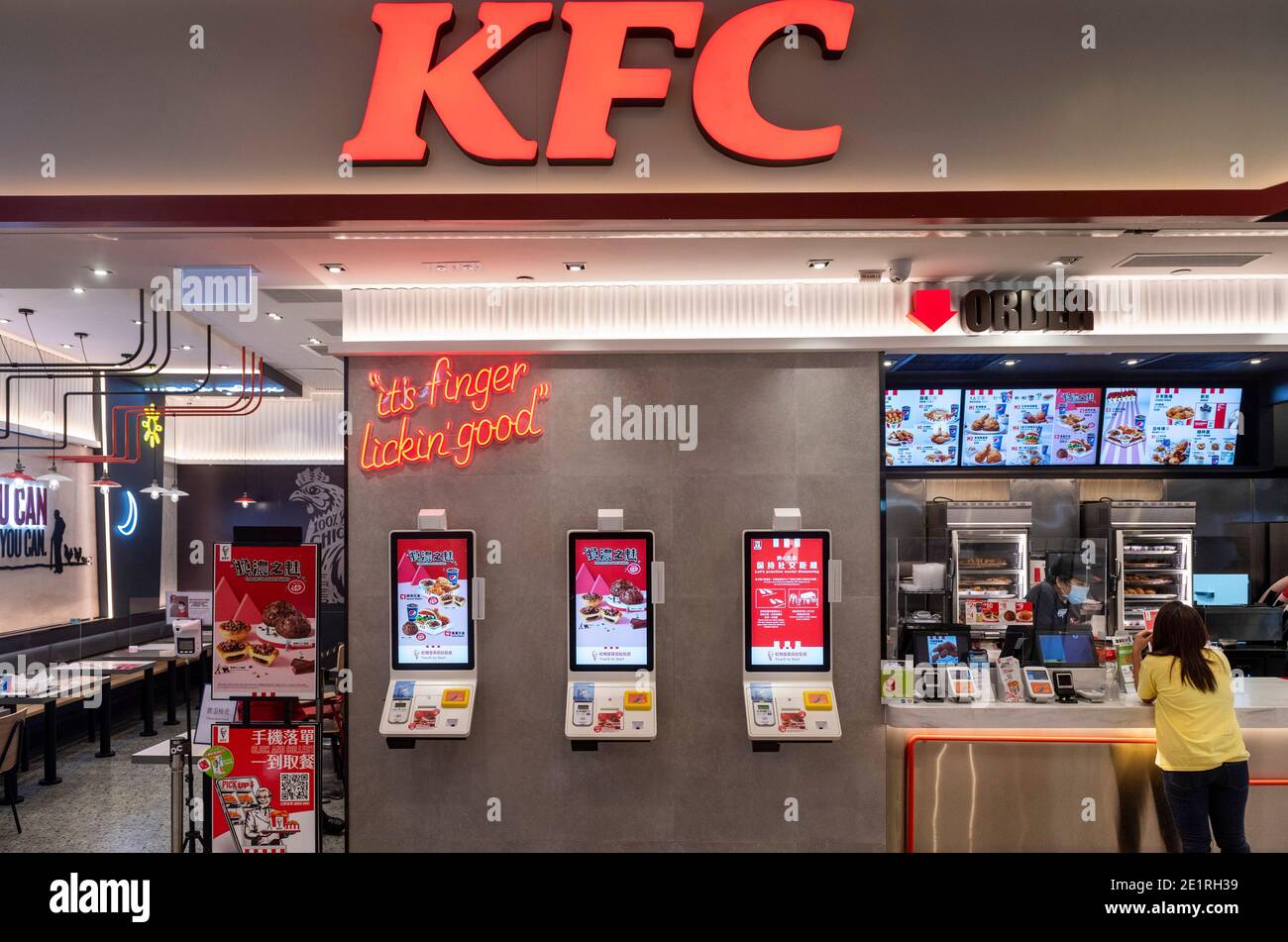 A customer orders food at the American fast food chicken restaurant ...