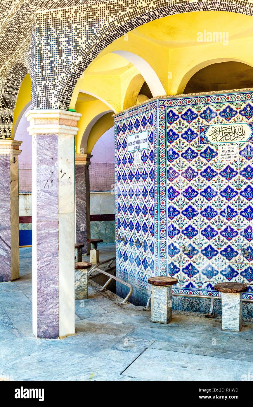 Ornate exterior covered with mosaic of the feet washing area at Merkez ...