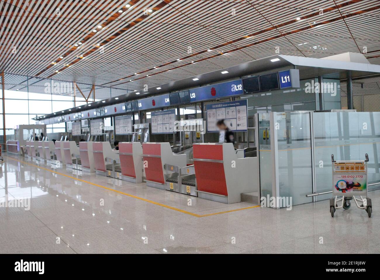 Chinese business womanat the check in counters high quality photo Stock ...