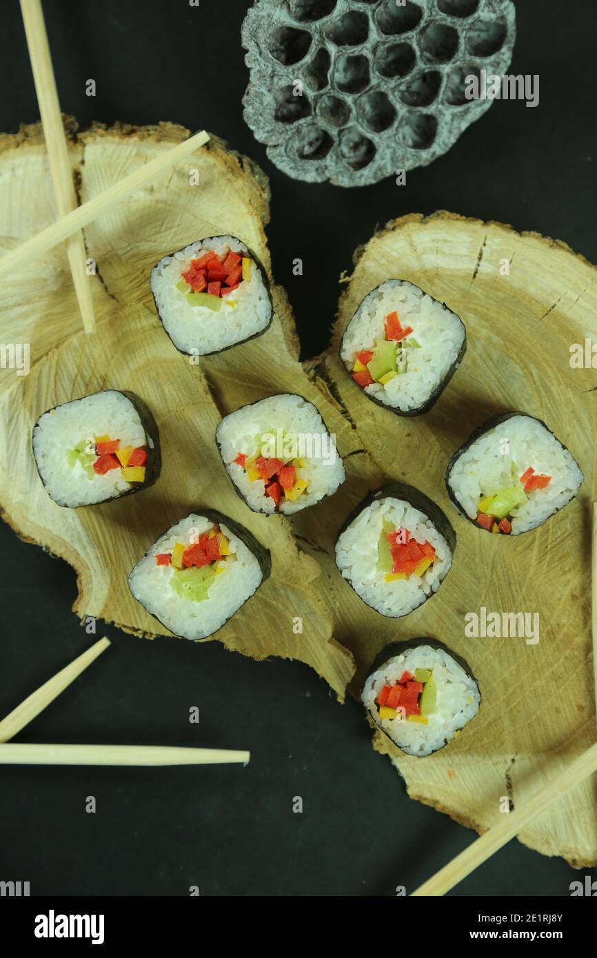Various kinds of sushi served, close-up view Stock Photo - Alamy