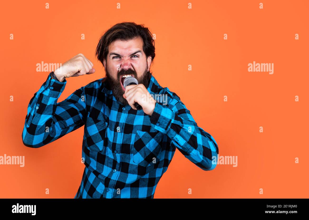 music concept. brutal handsome man with moustache. mature singer sing ...