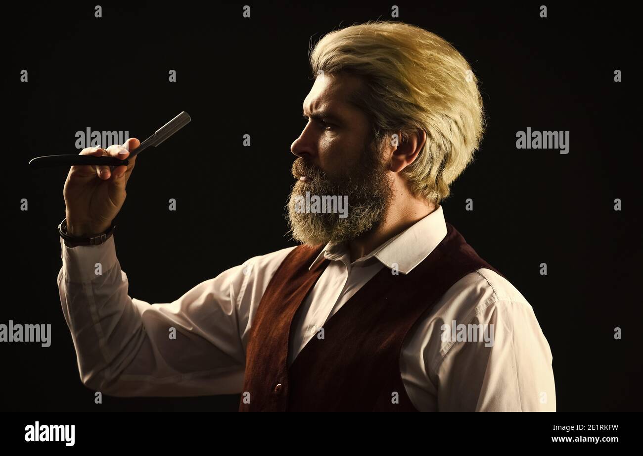 Barber scissors. barber shop. blond hairdresser or barber with scissors ...