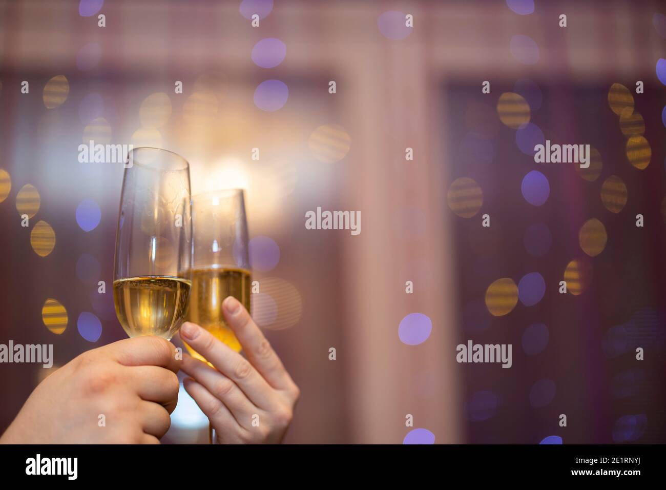 Beautiful view of man and women holding champagne glass. Love. Holiday ...