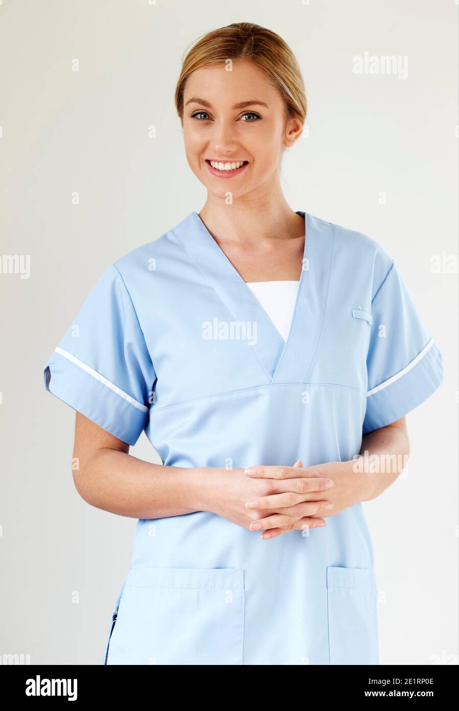 Portrait of nurse smiling Stock Photo - Alamy