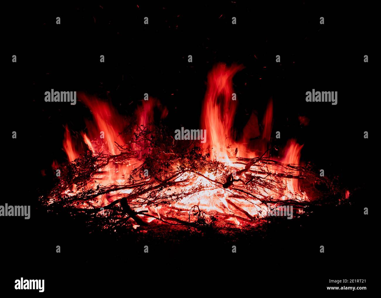 Branches on fire. Flames and sparkles on black background Stock Photo ...