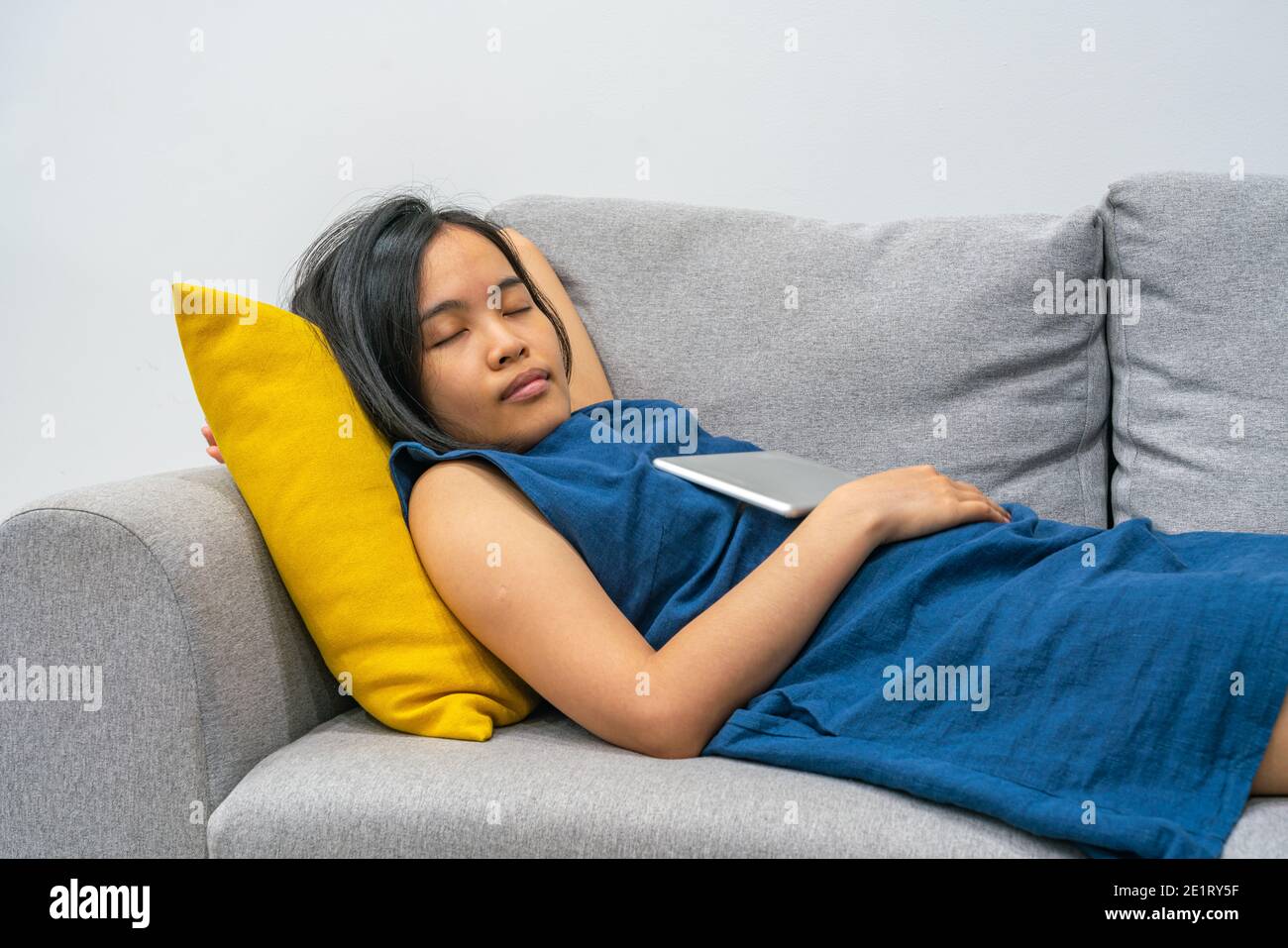 Woman fall asleep sofa hi-res stock photography and images - Alamy