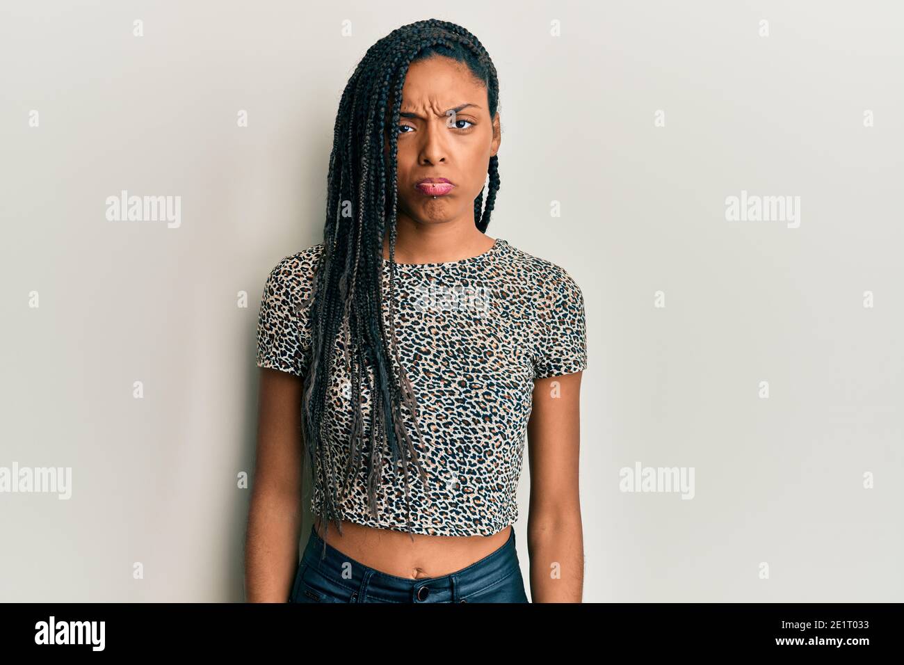 African american woman wearing casual clothes depressed and worry for ...