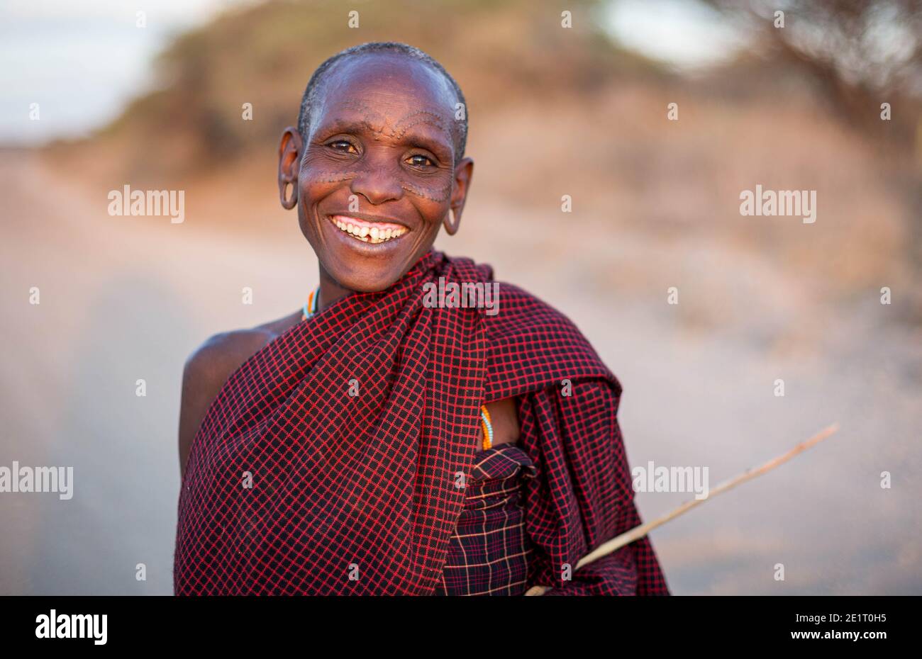 Middle aged Datoga Woman in her traditional clothes Stock Photo - Alamy