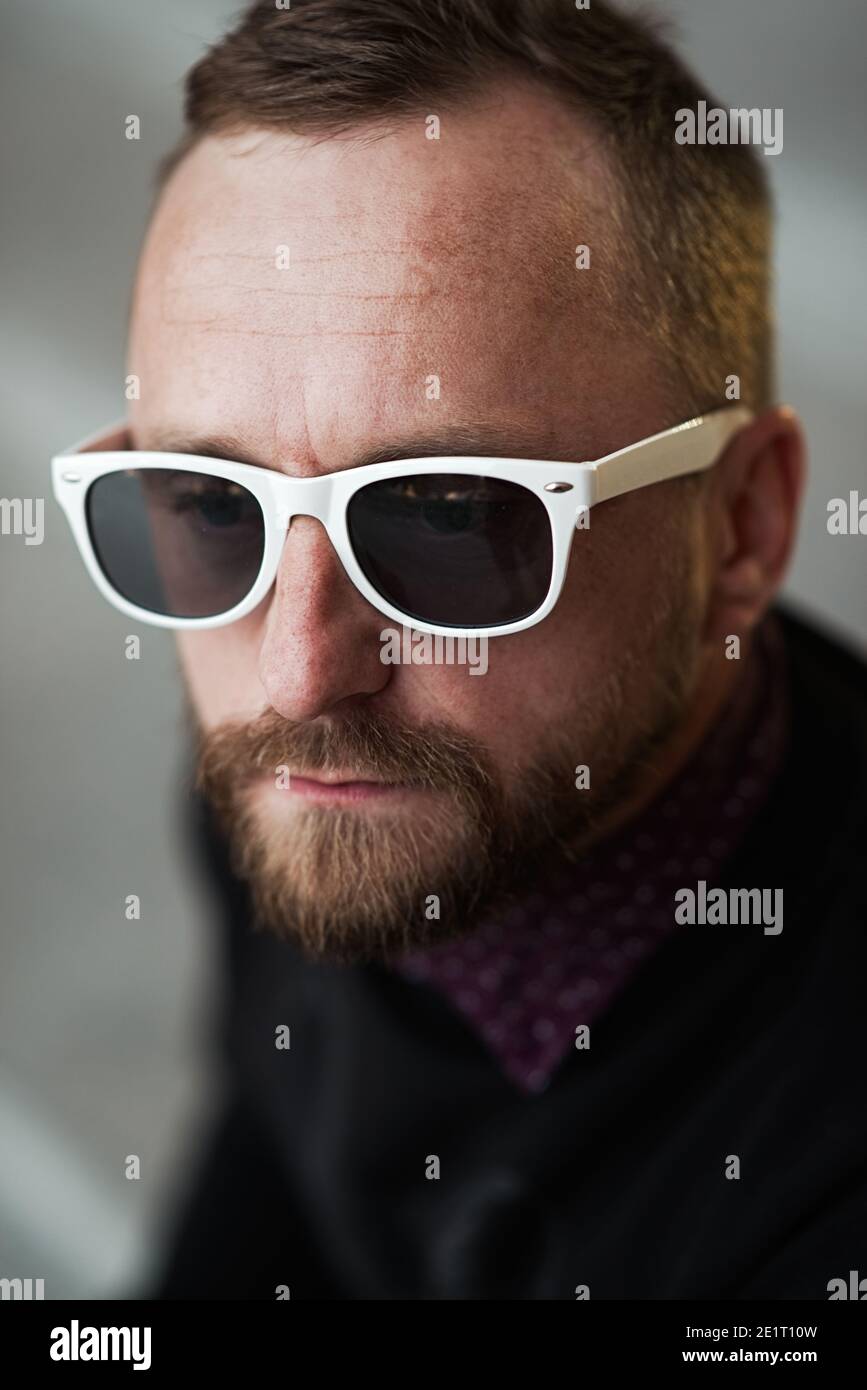 Bearded guy in black suit hi-res stock photography and images - Alamy