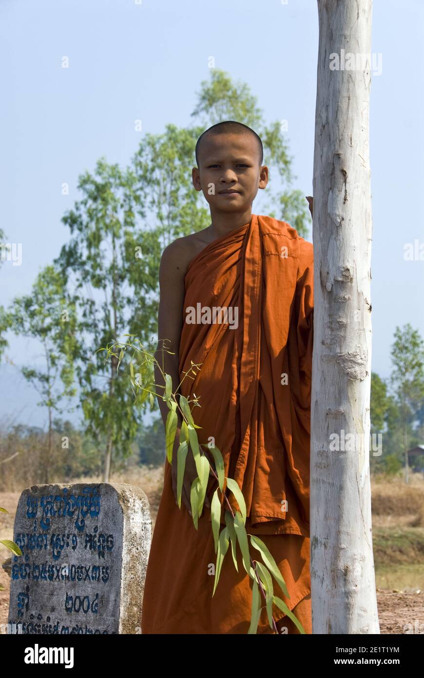 A young monk near the spot where dictator Pol Pot was cremated and ...