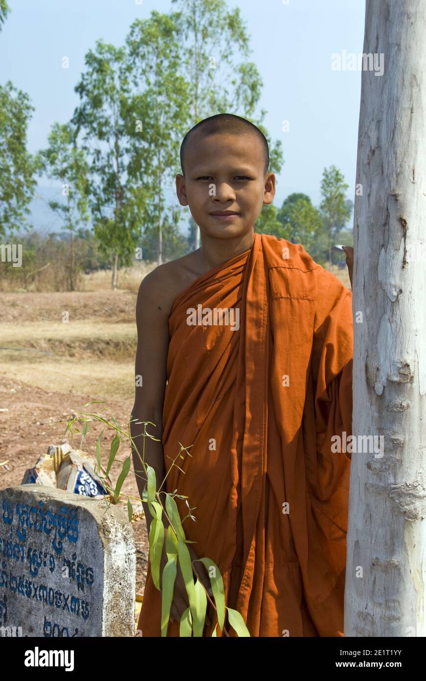 A young monk near the spot where dictator Pol Pot was cremated and ...