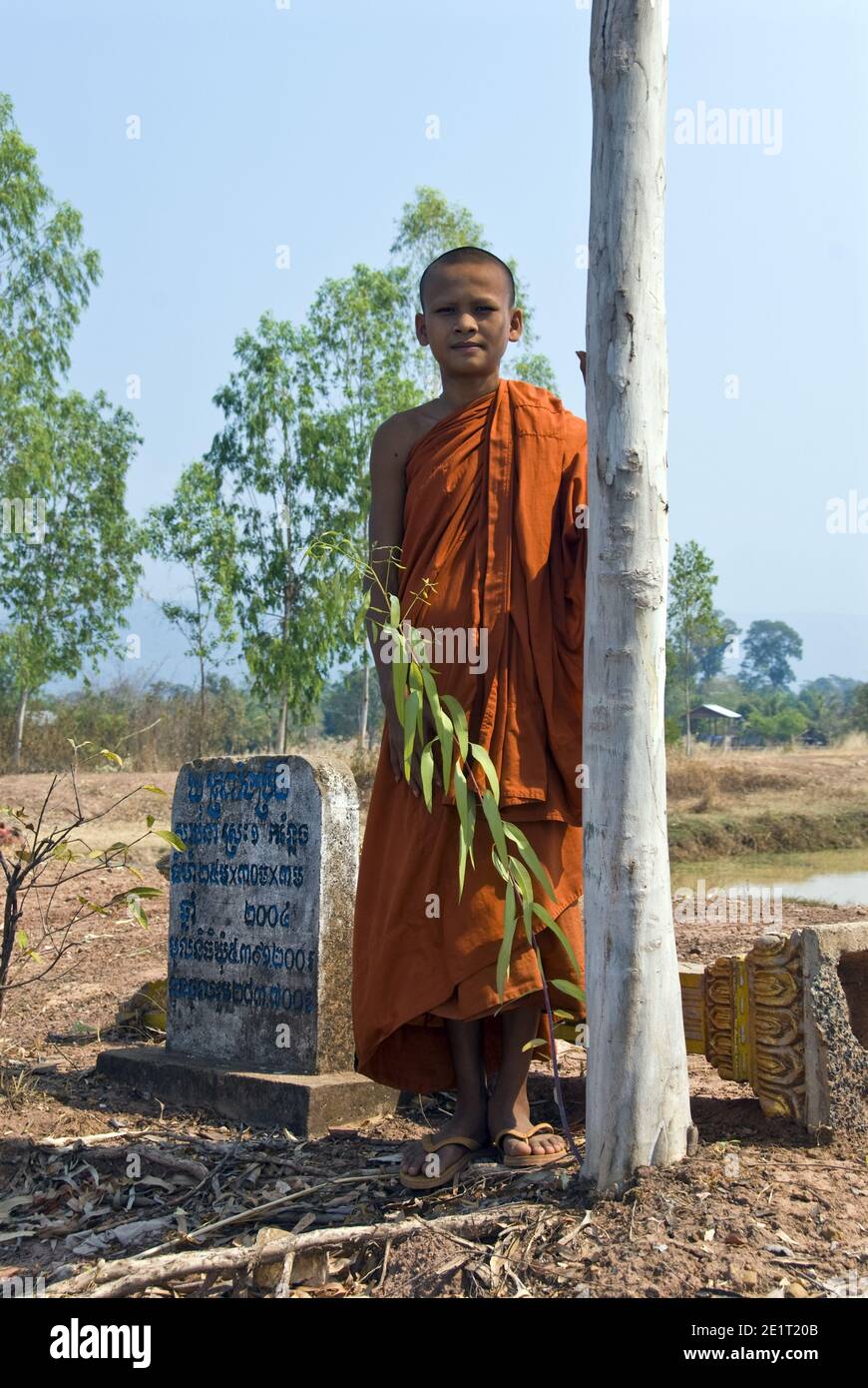 A young monk near the spot where dictator Pol Pot was cremated and ...