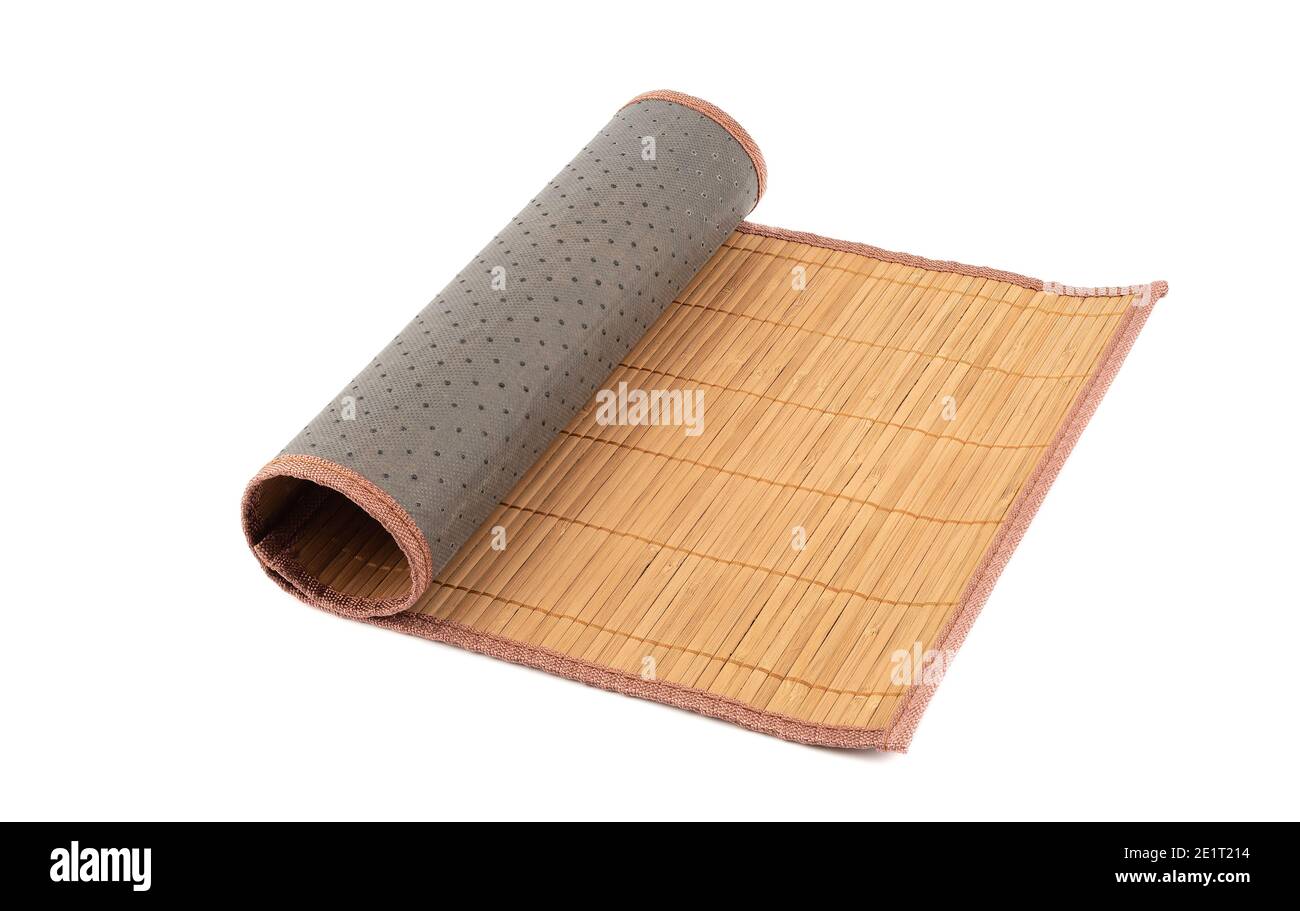 Rolled up bamboo food mat isolated on white background. Traditional ...