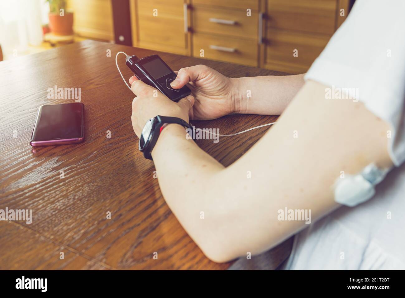 Modern diabetes treatment, woman checking glucose level and dosing ...