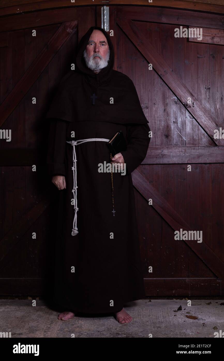 Franciscan monk, barefooted, with his bible Stock Photo - Alamy