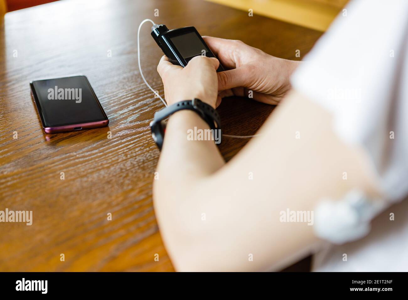 Modern diabetes treatment, woman checking glucose level and dosing ...