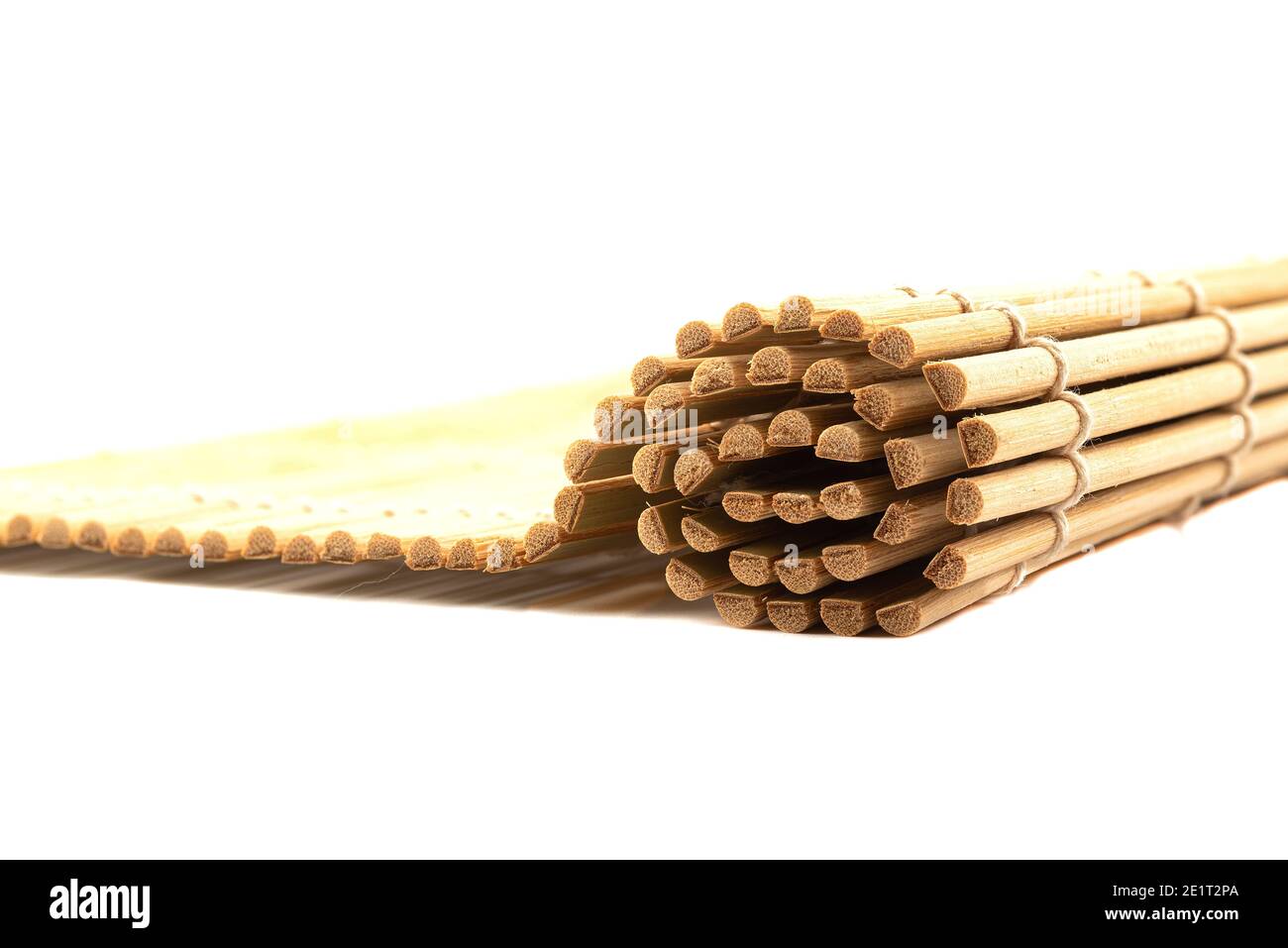 Soft focus. Rolled up bamboo food mat isolated on white background ...