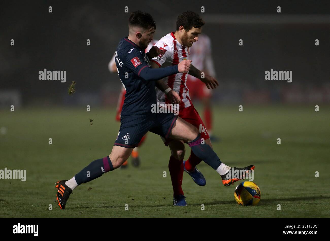 Stevenage's Romain Vincelot (right) and Swansea City's Ryan Manning ...