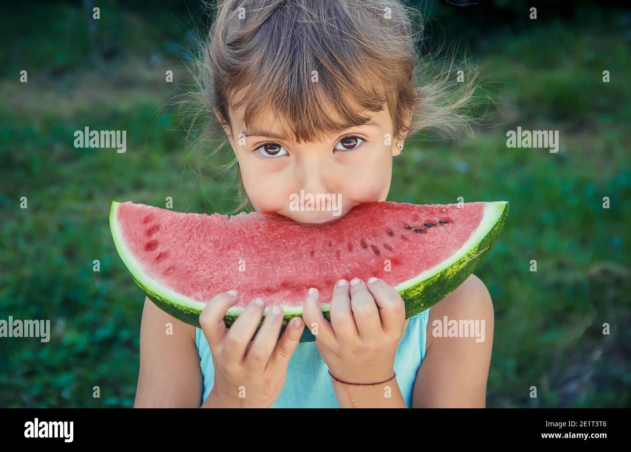 Child eats watermelon in summer hi-res stock photography and images - Alamy