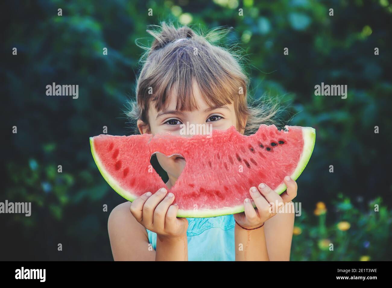 Child eats watermelon in summer hi-res stock photography and images - Alamy