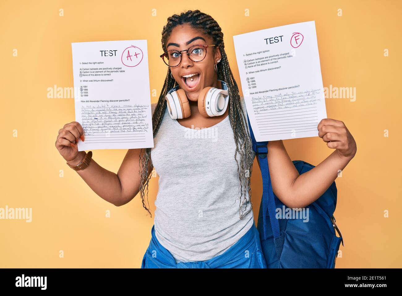 Young african american woman with braids showing failed and passed exam ...