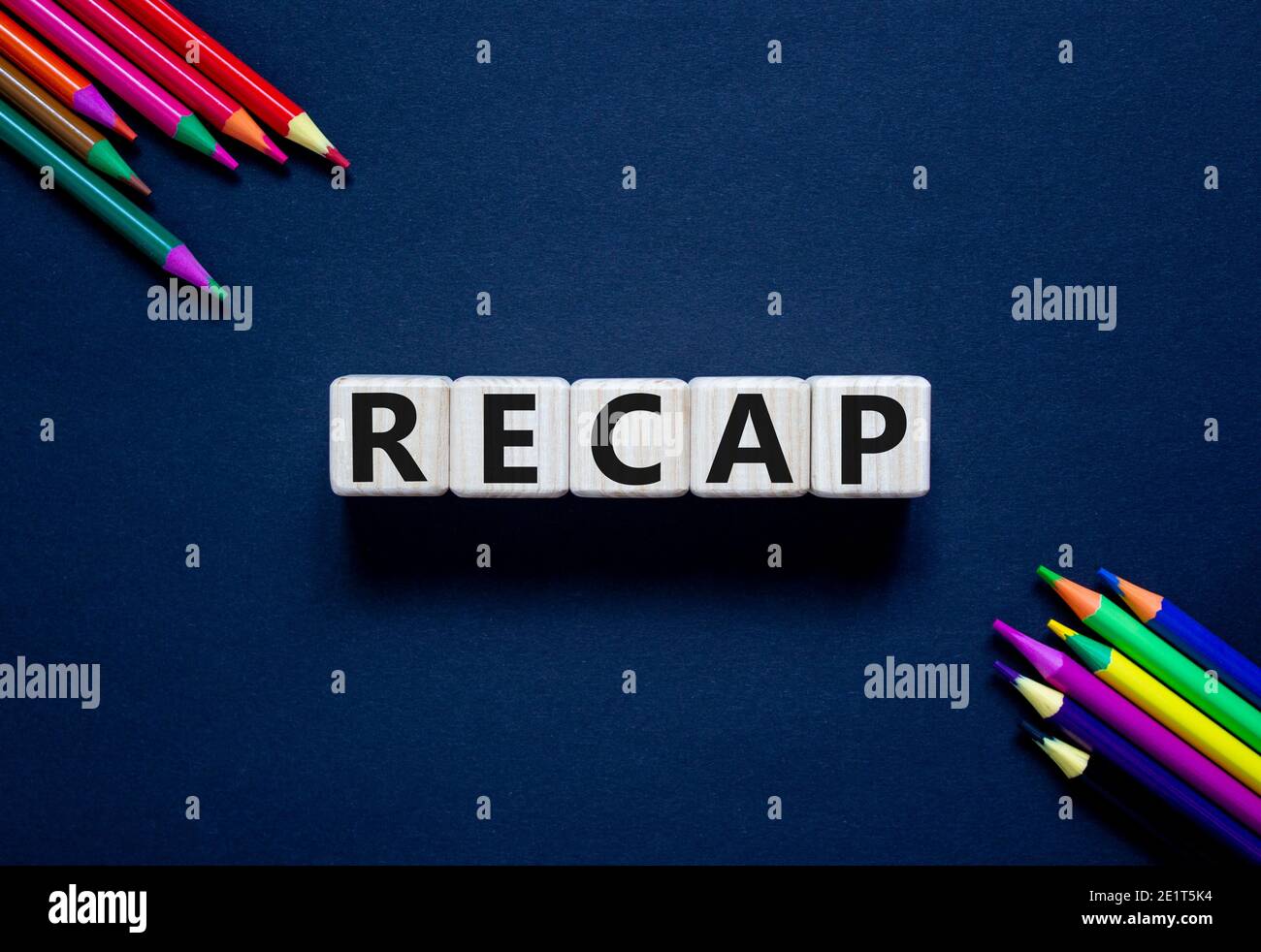 Recap symbol. The word 'recap' on wooden cubes on beautiful grey ...