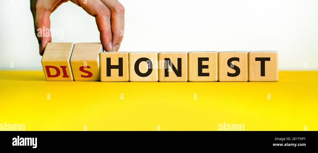 Honest or dishonest symbol. Businessman hand turns cubes and changes ...