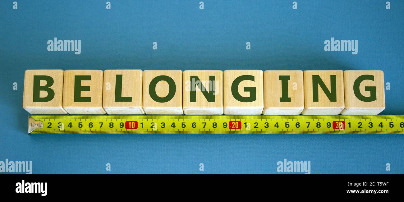 Belonging and better inclusion symbol. Belonging word on cubes arranged ...