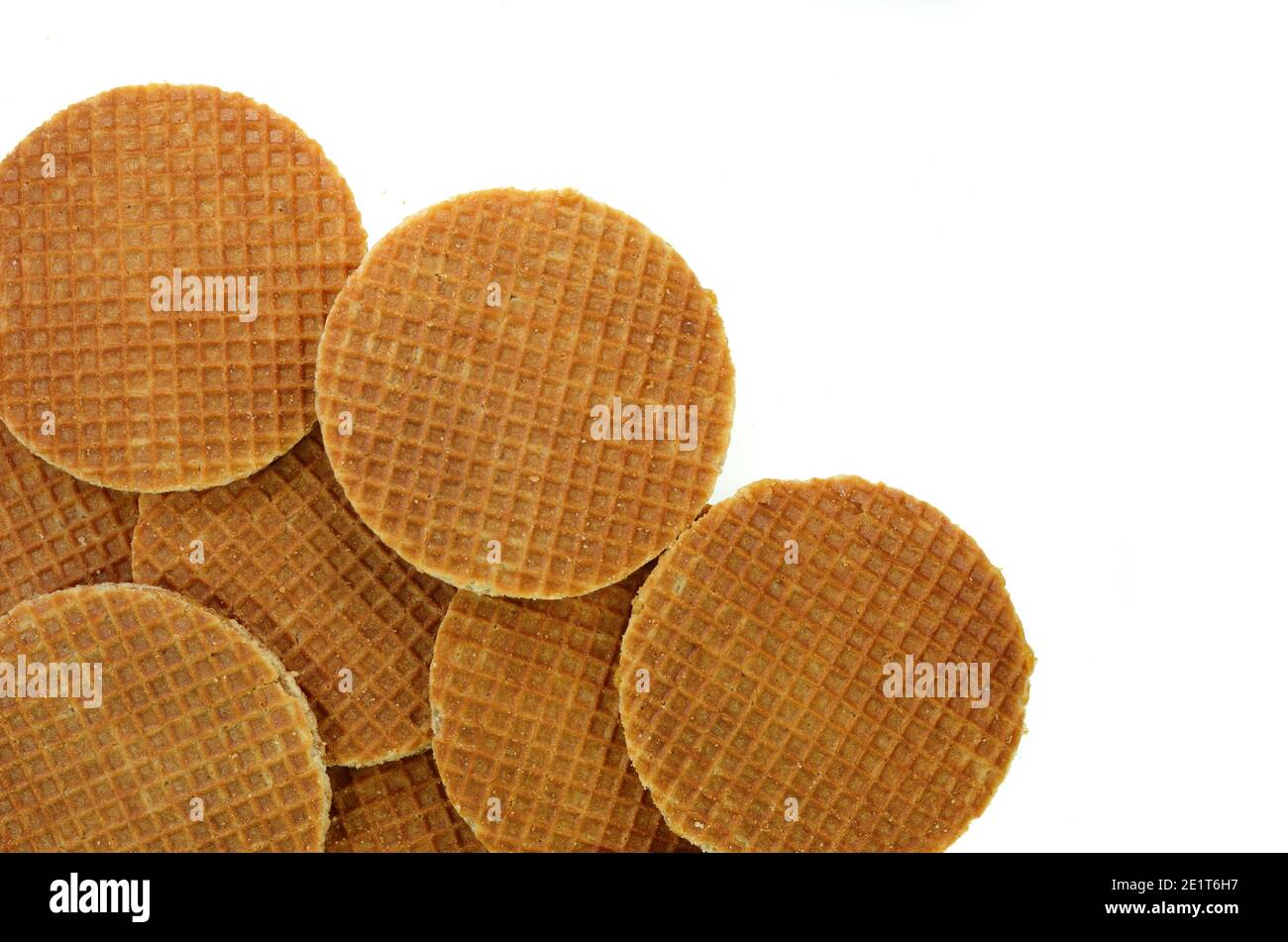 Stack of Dutch stroopwafel cookies or caramel waffles isolated on white ...