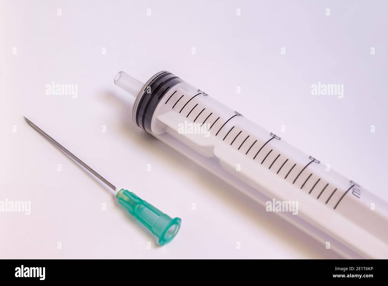 Syringe and needle on white background Stock Photo - Alamy